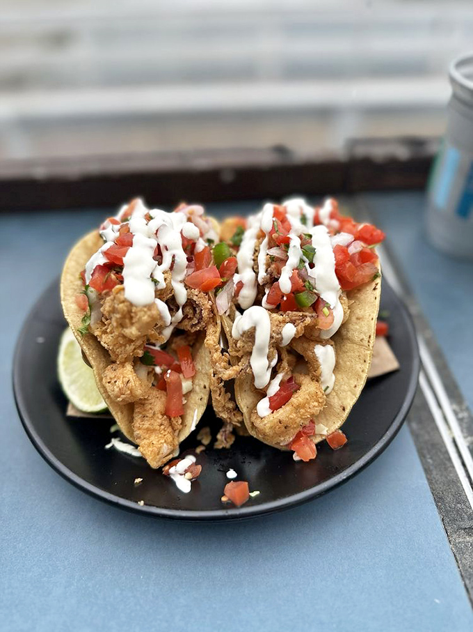 Fish tacos done right: crispy, fresh, and loaded with enough toppings to require both hands and several napkins.