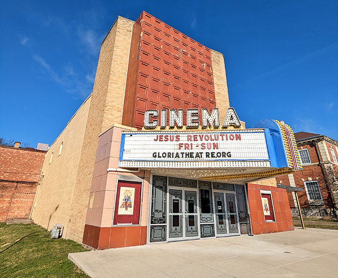 The Gloria Theatre's marquee lights up downtown like a beacon from another era, when going to the movies was an event worth dressing up for.
