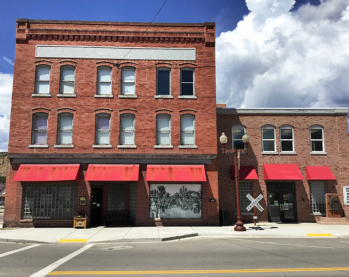 The Helper Museum's classic brick fa&ccedil;ade and cheery red awnings invite visitors to step inside and discover why this small town deserves a much bigger spot on Utah's tourism map.