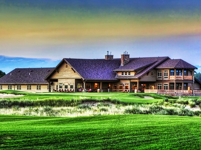 The Prairie Club's lodge stands as a cathedral to golf, where the religion is 18 holes and the stained glass is replaced by panoramic Sandhills views.