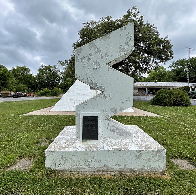 The zigzag sculpture looks like someone played Tetris with concrete blocks and decided to call it art.