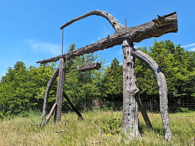 This rustic wooden gate looks like it should have a sign reading "Abandon all cell service, ye who enter here."