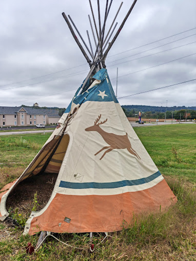 A closer look at the teepee reveals beautiful artwork and traditional design. This unexpected addition creates a diverse cultural landscape worth exploring.