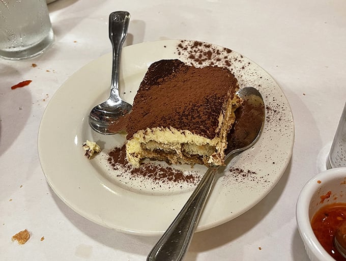 Tiramisu that strikes the perfect balance between coffee-soaked decadence and cloud-like mascarpone. The dusting of cocoa is the final brushstroke on this masterpiece.
