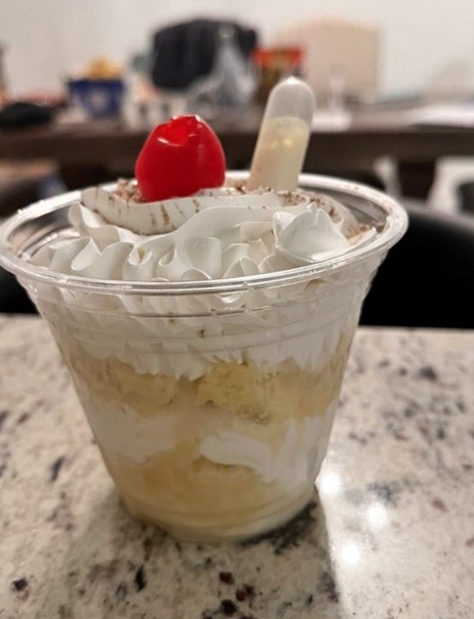 A parfait topped with whipped cream and a cherry&mdash;the dessert equivalent of dressing up for a night out when you're staying in.