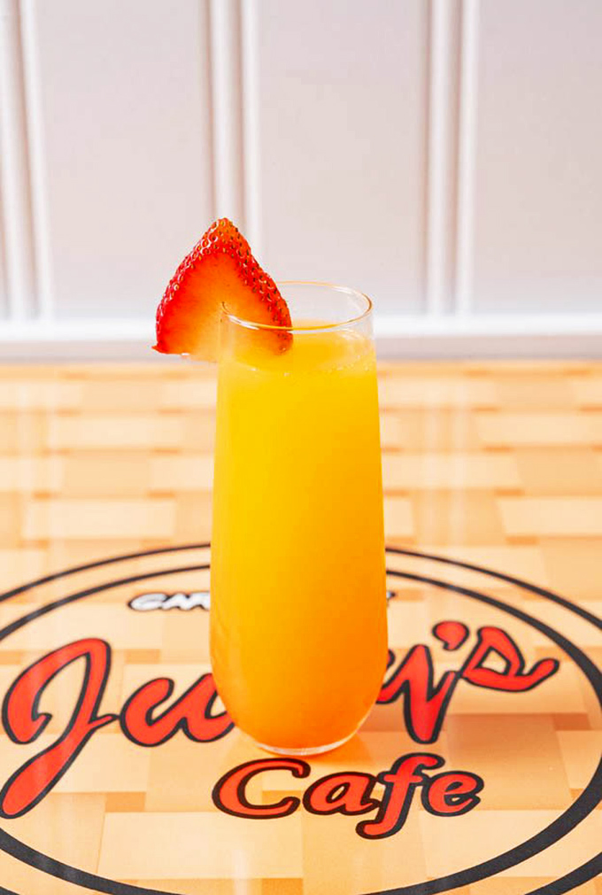 Their mimosa brings sunshine to your table with a strawberry garnish that's not just decorative &ndash; it's a promise that today is worth celebrating.