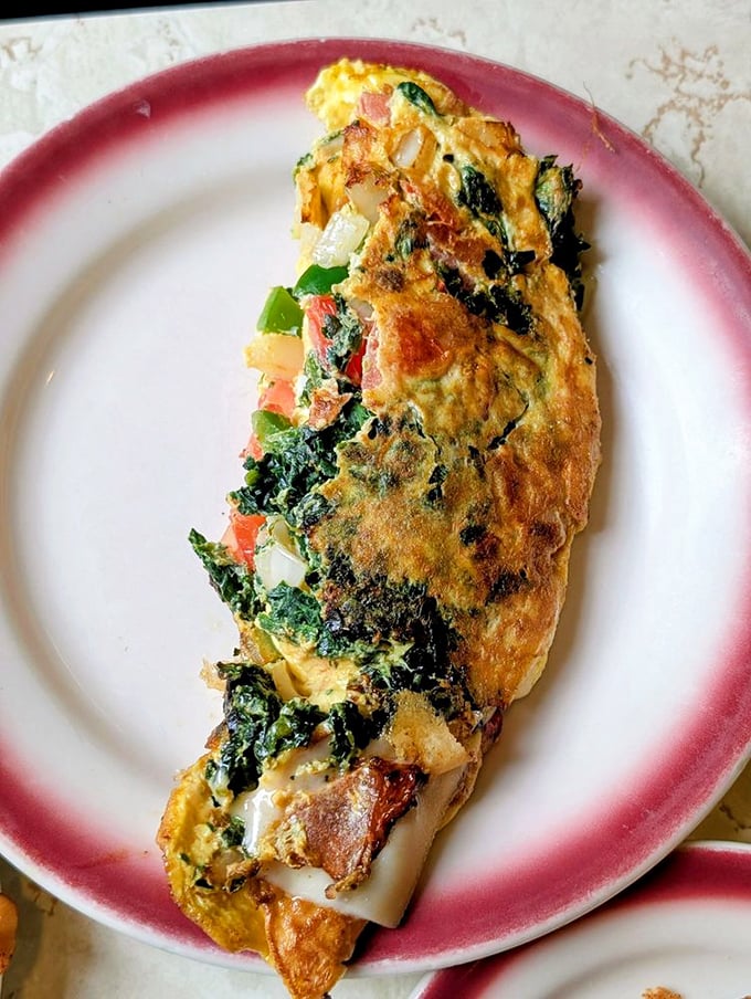 An omelet that doesn't just contain vegetables&mdash;it celebrates them. Folded with the precision of an origami master.