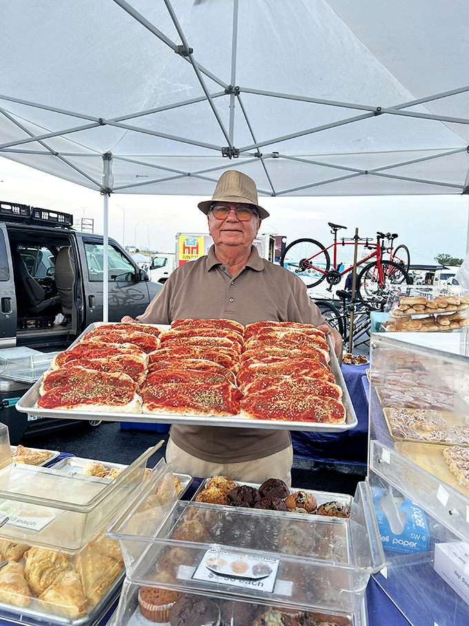 The pastry whisperer shows off his wares. Those tomato-topped focaccia squares might be worth the trip alone.