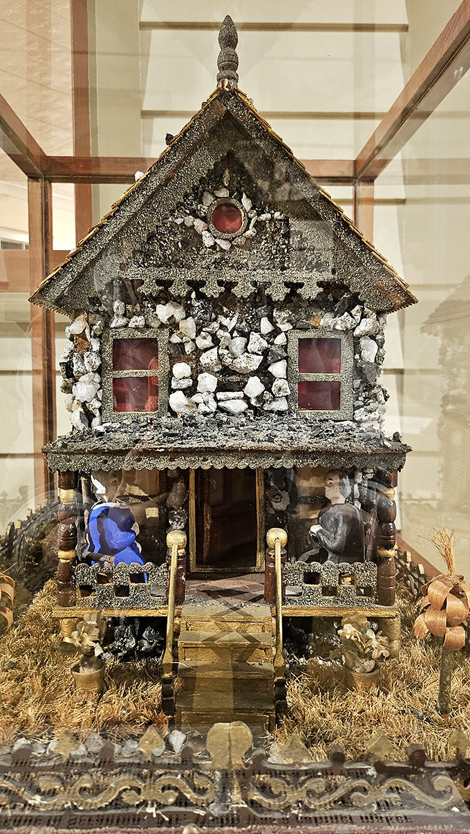 This intricate shell art house showcases miners' creative spirits. When life gives you coal dust, sometimes you make exquisite miniature architecture.