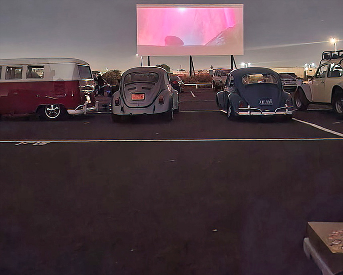 Vintage VWs and classic cars create the perfect retro atmosphere. Some vehicles seem specifically designed for the drive-in experience.