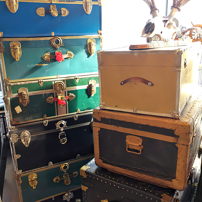 These vintage trunks didn't just carry clothes—they carried dreams across oceans and continents before finding their way here.