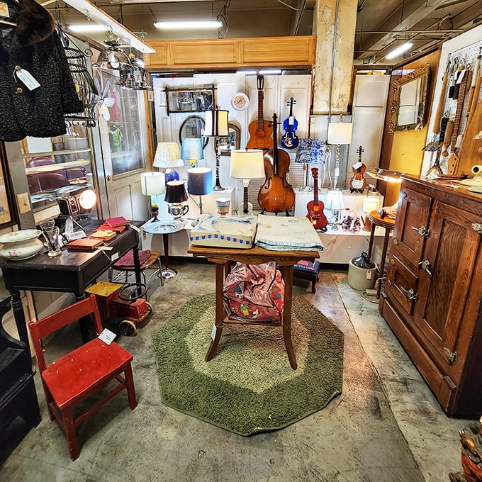 A musical corner where vintage instruments wait for their second act. That upright bass has definitely seen more jam sessions than your garage band.