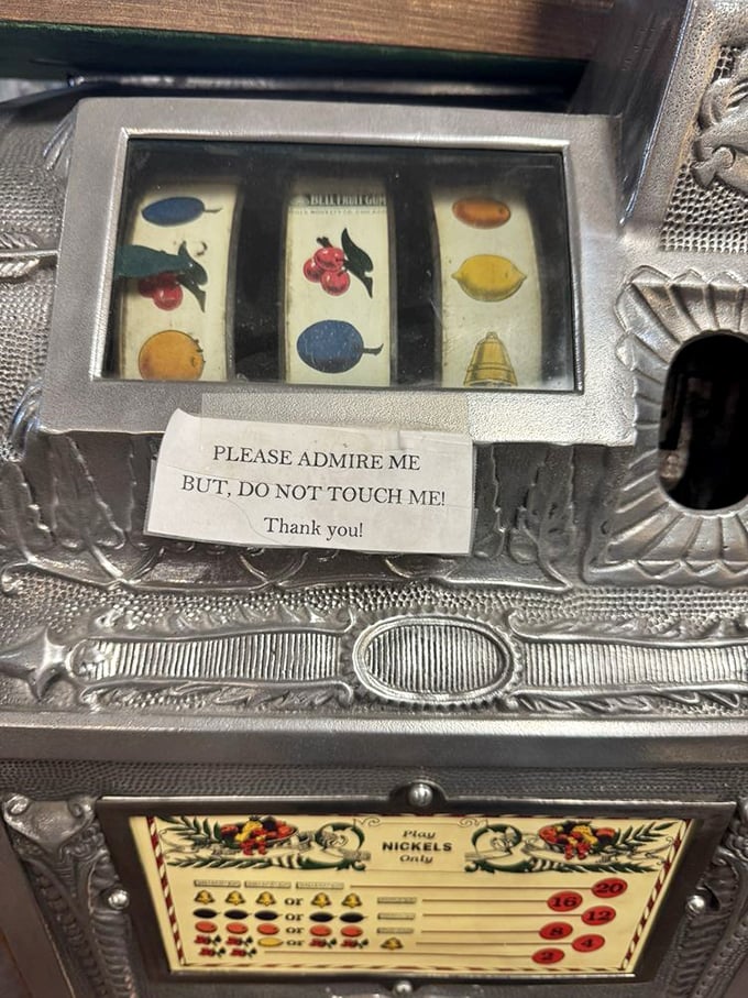 "Please admire me but do not touch me!" This vintage slot machine has more personality than most modern electronics.