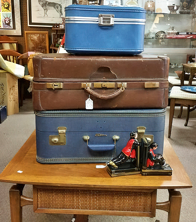 Vintage luggage stacked like a traveler's layer cake. These suitcases have stories to tell, if only their leather sides could talk.