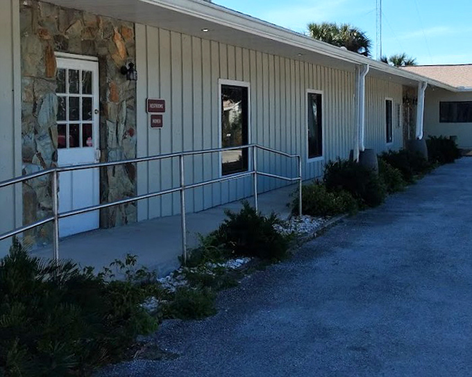 Simple architecture with a purpose: to welcome explorers before they discover what "Old Florida" really means.