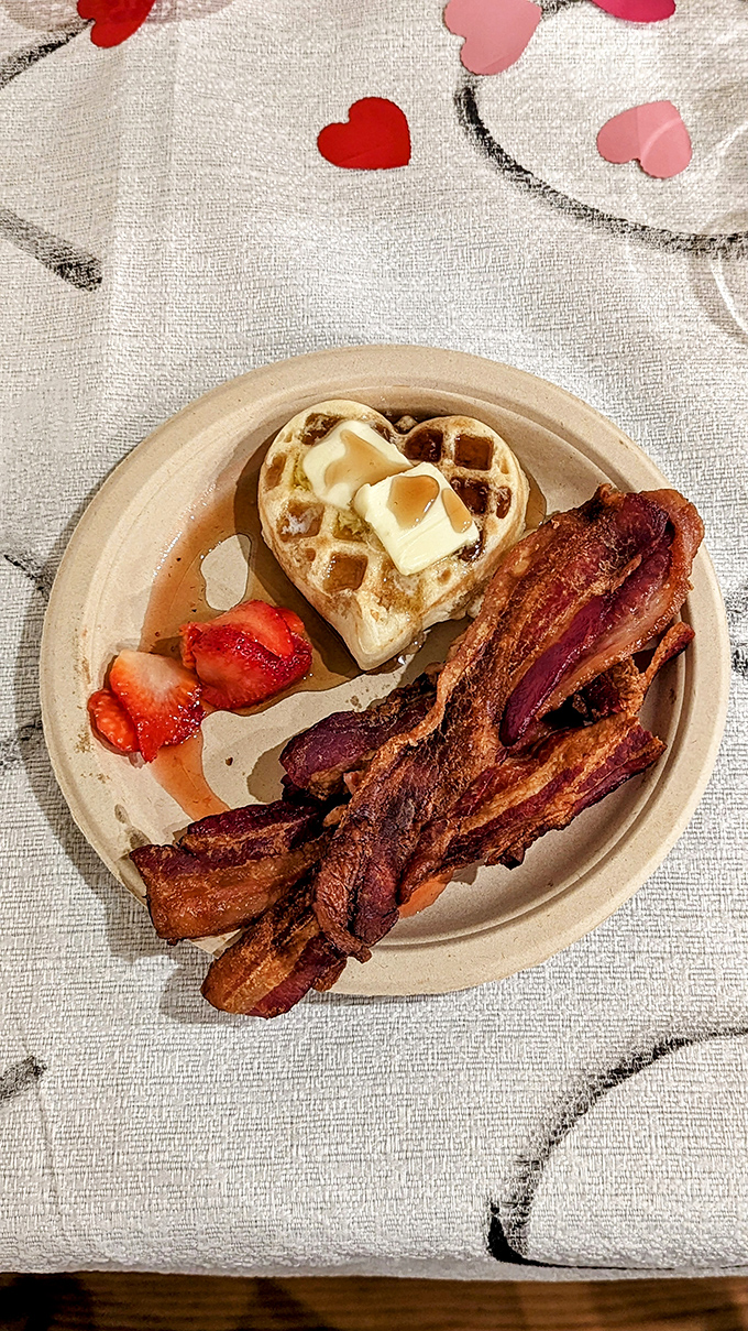 Heart-shaped waffle meets perfectly crisped bacon&mdash;a breakfast romance that puts most Hollywood love stories to shame.