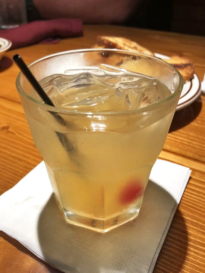 This whiskey sour isn't just a drink – it's liquid sunshine in a glass, ready to complement whatever beef masterpiece you've ordered.
