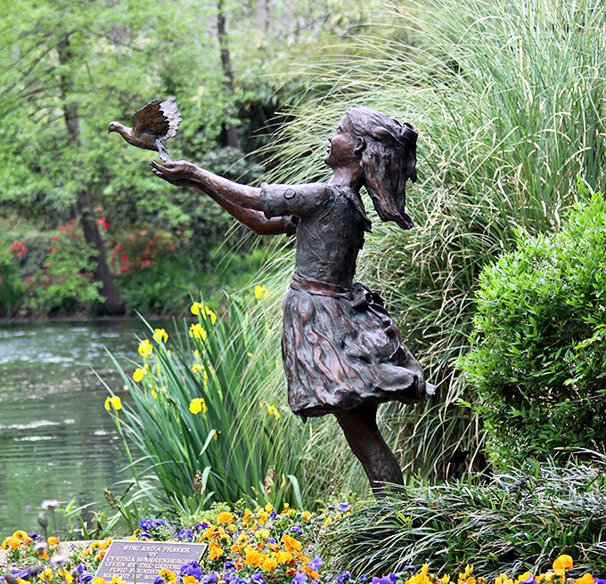 This bronze girl releasing a bird captures that bittersweet moment of letting go. Freedom and farewell, beautifully rendered in timeless metal.