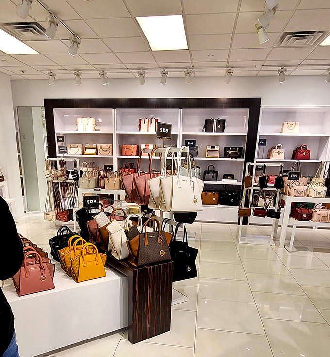 Designer handbags arranged like museum pieces&mdash;except here, you're actually encouraged to touch the exhibits.
