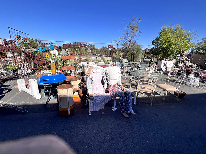 The outdoor display area spills into the sunshine, where garden treasures and weathered furniture await their second act.