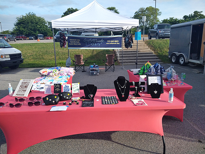 Outdoor vendors bring their A-game with eye-catching displays. That pink tablecloth isn't just practical&mdash;it's strategic marketing at its finest.