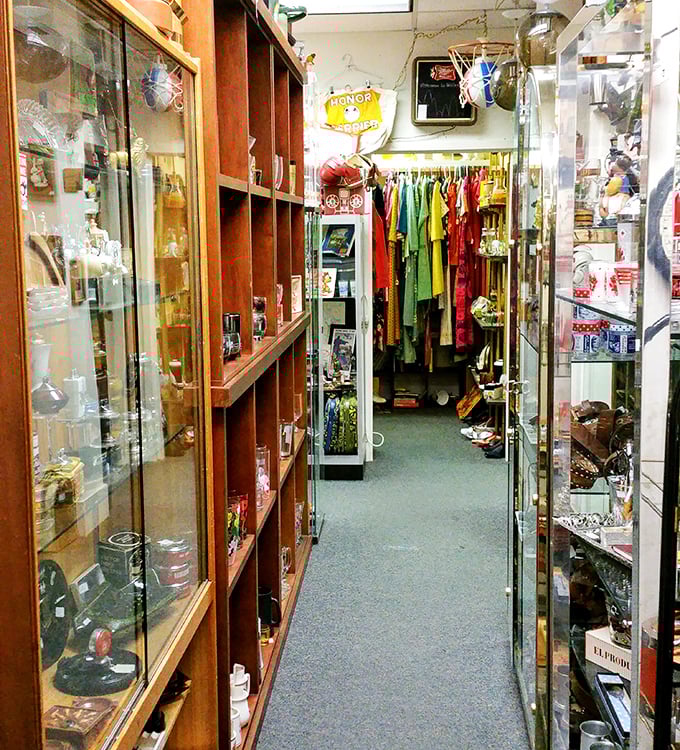 Narrow pathways of discovery where every turn reveals another decade's treasures. This isn't shopping—it's time travel with price tags.