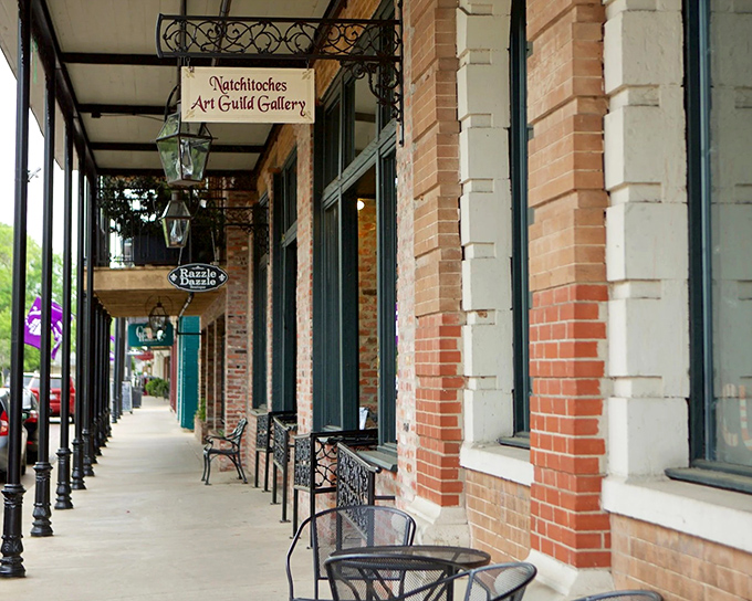 The Natchitoches Art Guild Gallery beckons creative souls and the merely curious alike. Those wrought-iron benches aren't just seating—they're front-row tickets to street theater.
