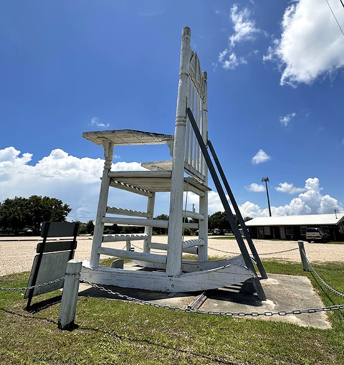 The chair's crisp white paint pops against the blue Mississippi sky &ndash; a beacon for road-weary travelers.