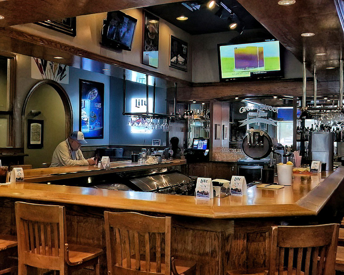 The bar area: where strangers become friends, sports become religion, and nobody judges you for ordering that second beer.