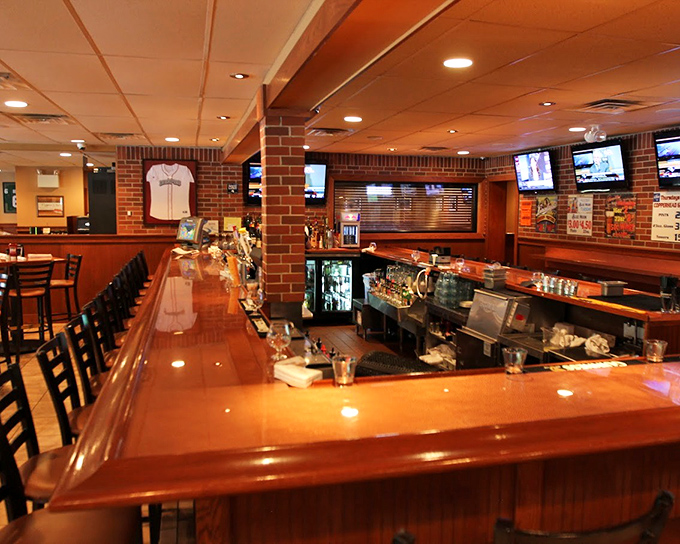 The bar area: where strangers become friends, where beers are cold, and where nobody judges you for cheering too loudly at the game-winning play.