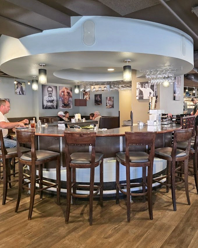 The circular bar isn't just functional—it's where solo diners become temporary family and strangers share food recommendations like treasured family heirlooms.