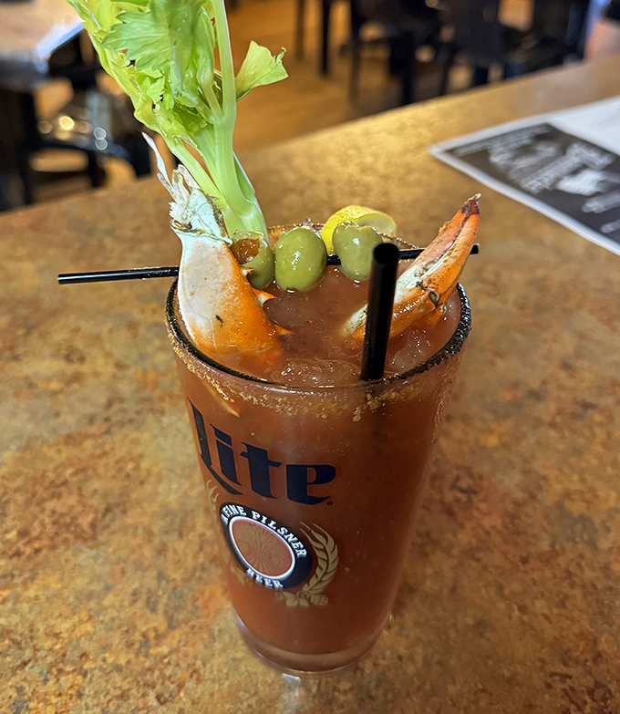 Their Bloody Mary isn't just a drink; it's a meal in a glass topped with enough garnishes to count as appetizers.