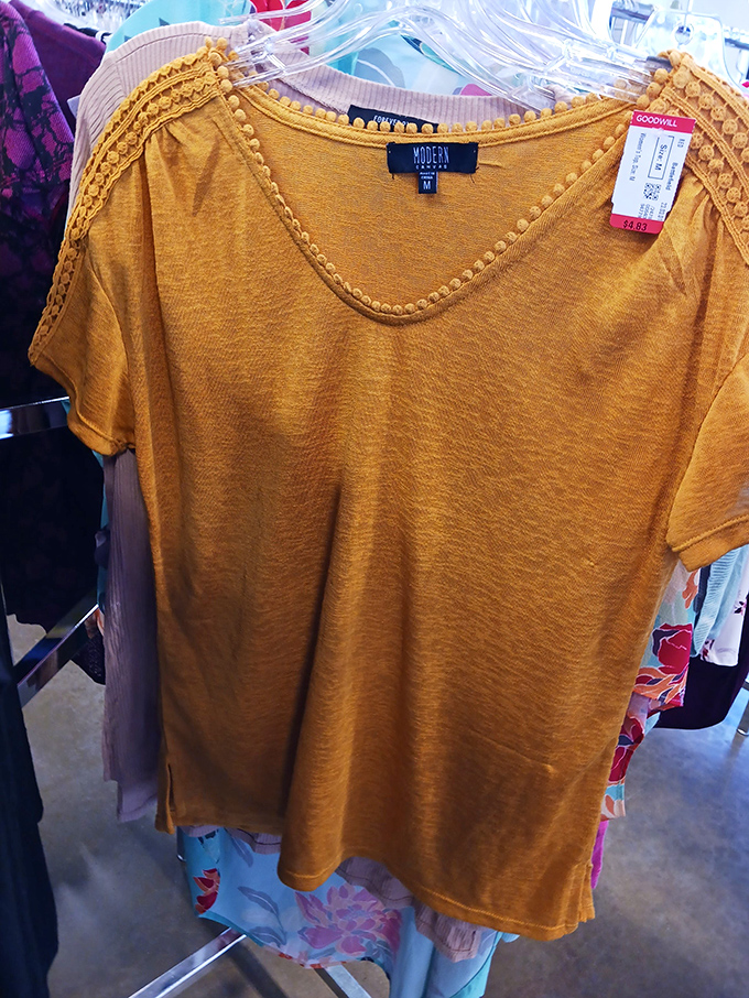 This mustard-colored top still sports its original tags&mdash;the thrift gods have smiled upon some lucky shopper today.