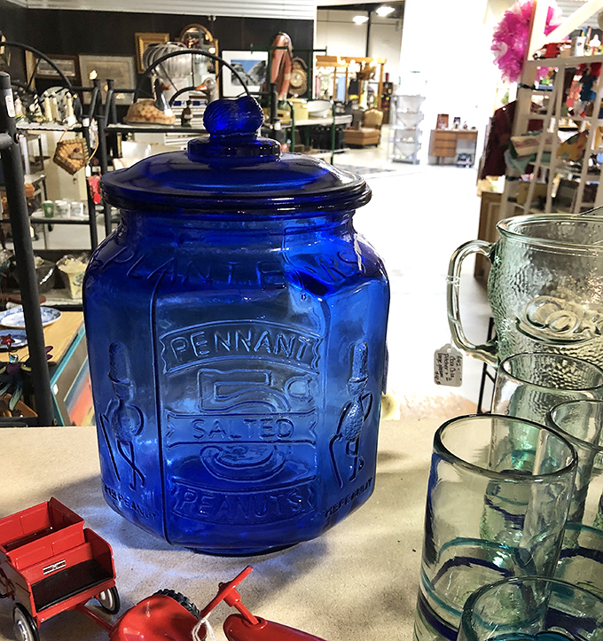 This cobalt blue Pennant peanut jar isn't just glassware&mdash;it's a sapphire time capsule from when snacks came in containers worth keeping forever.
