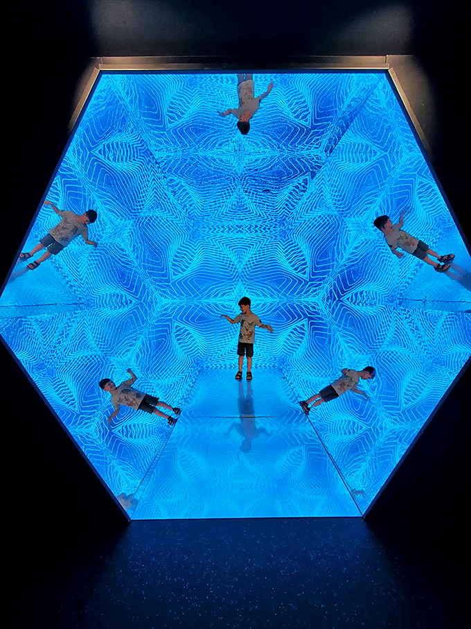 The hexagonal infinity mirror transforms visitors into a cosmic constellation of themselves&mdash;like starring in your own personal universe.