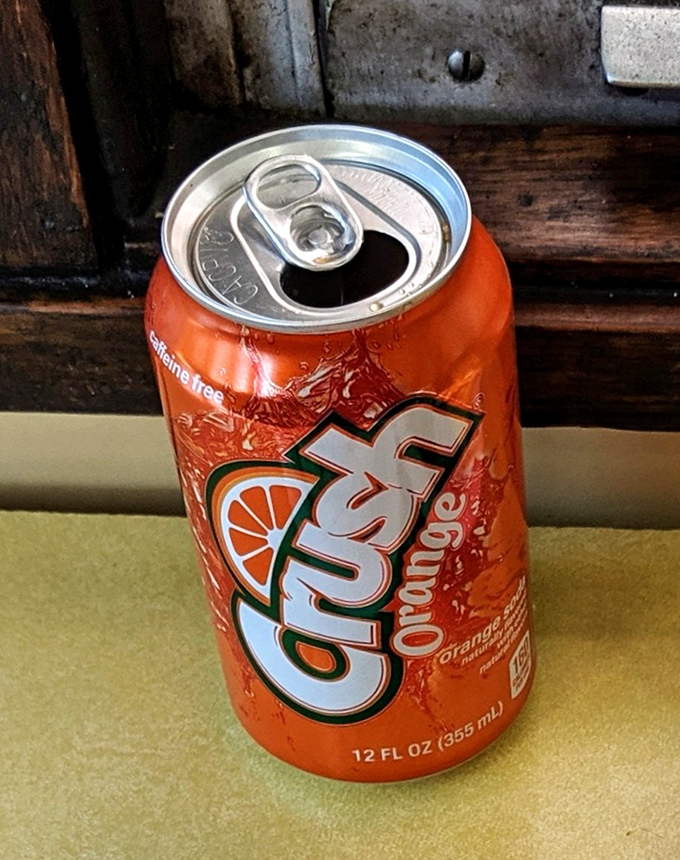 Even the soda feels nostalgic here, an ice-cold Crush that takes you back to simpler times with every fizzy sip.