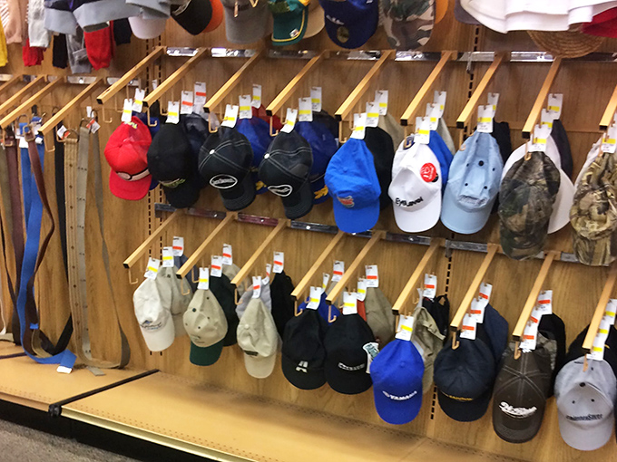 Baseball caps hang like trophies of forgotten teams and abandoned hobbies&mdash;each one a conversation starter waiting to crown a new head.