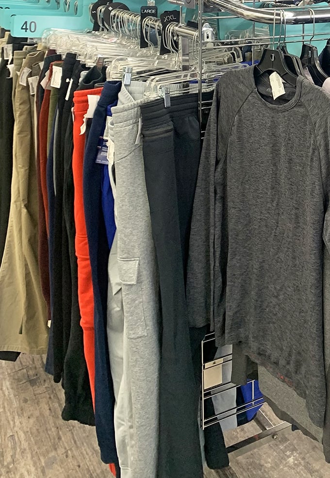 A rainbow of casual pants and tees stands at attention, like a fashionable army ready to march into your wardrobe without declaring war on your wallet.