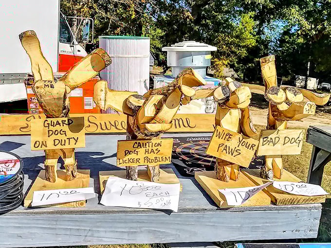 "Guard Dog on Duty" wooden sculptures with personality to spare. These charming canine creations prove that one person's scrap wood is another's folk art masterpiece.
