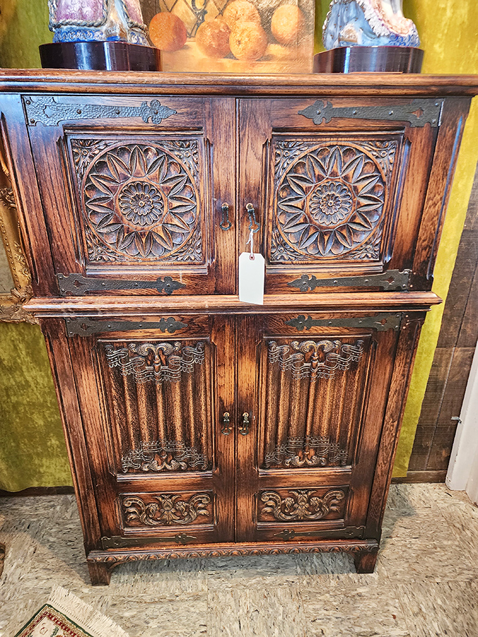 Hand-carved wooden cabinets with intricate details that modern mass production gave up on decades ago.