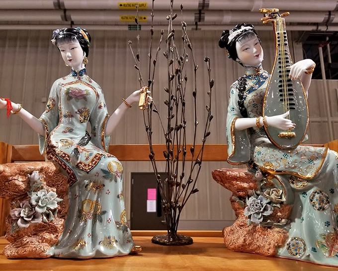 Porcelain elegance from another era. These delicate musicians have traveled far to grace someone's curio cabinet with their frozen melodies.