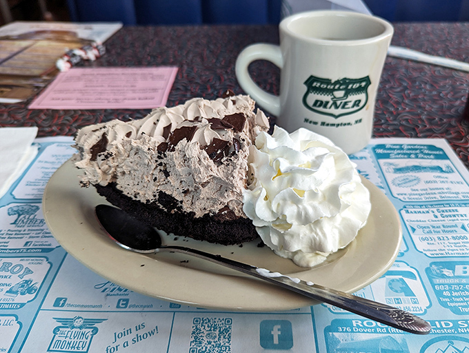A slice of chocolate cream pie that makes time stand still. That mountain of whipped cream isn't just a topping&mdash;it's the cloud you'll float away on.