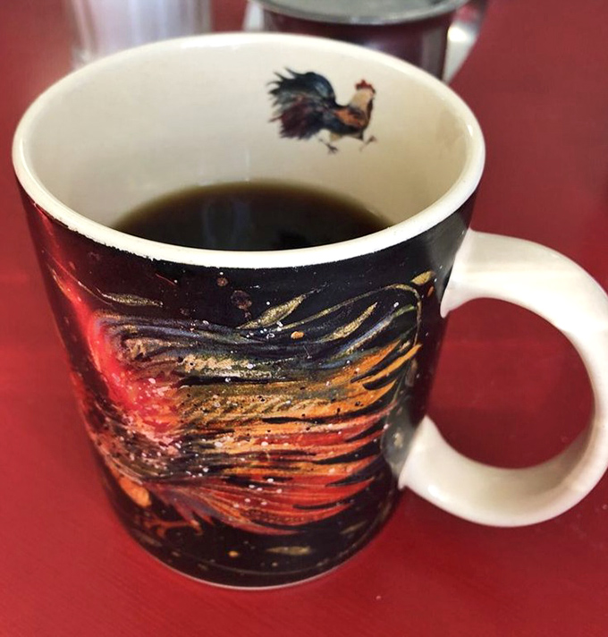 Even the coffee mugs tell a story here—this cosmic rooster vessel promises to jumpstart your morning with caffeine and character.