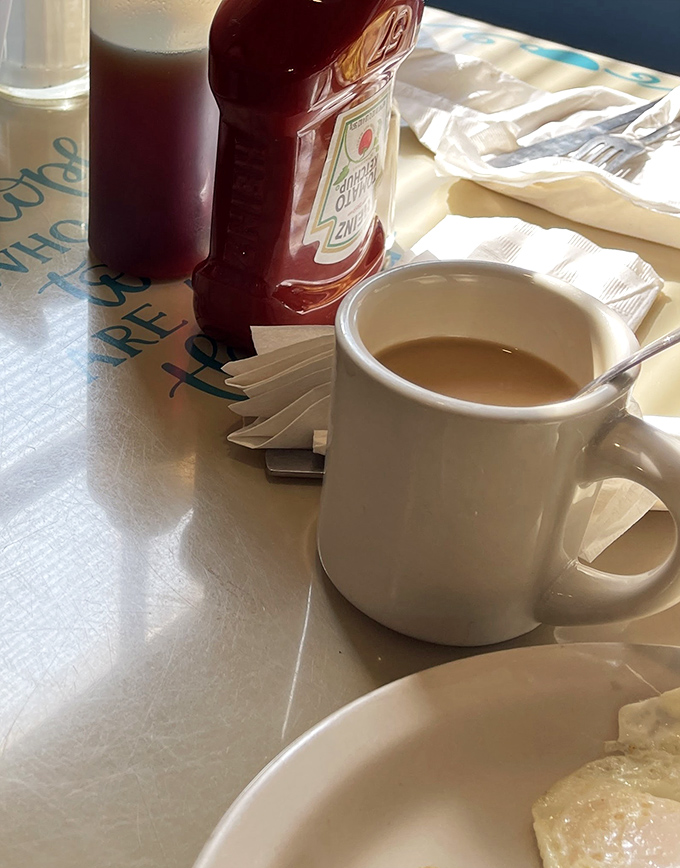 The humble white mug &ndash; unassuming vessel for the life-giving elixir that makes morning conversations possible.