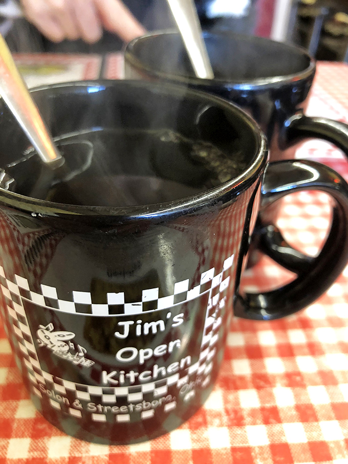 The checkered coffee mug isn't just holding caffeine&mdash;it's cradling liquid motivation that's fueled Solon's morning conversations and workdays for generations. 