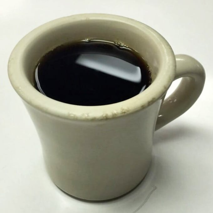 Coffee so honest it could run for office, served in a mug that means business, not aesthetics.