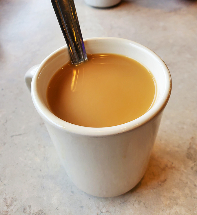 The elixir of diner life&mdash;coffee in its natural habitat. Amber-hued, steam rising, promising to transform you from zombie to human.