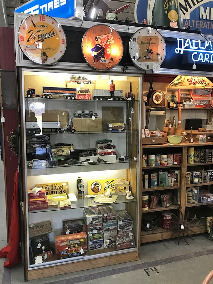 Vintage advertising meets model cars in this booth. Those illuminated clocks still know the time, even if it's perpetually 1955 in their world.