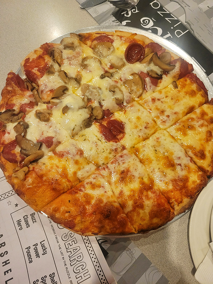 This combination pizza doesn't just combine toppings&mdash;it unites them in a bubbling, golden alliance that makes you wonder why you'd ever order just one topping.