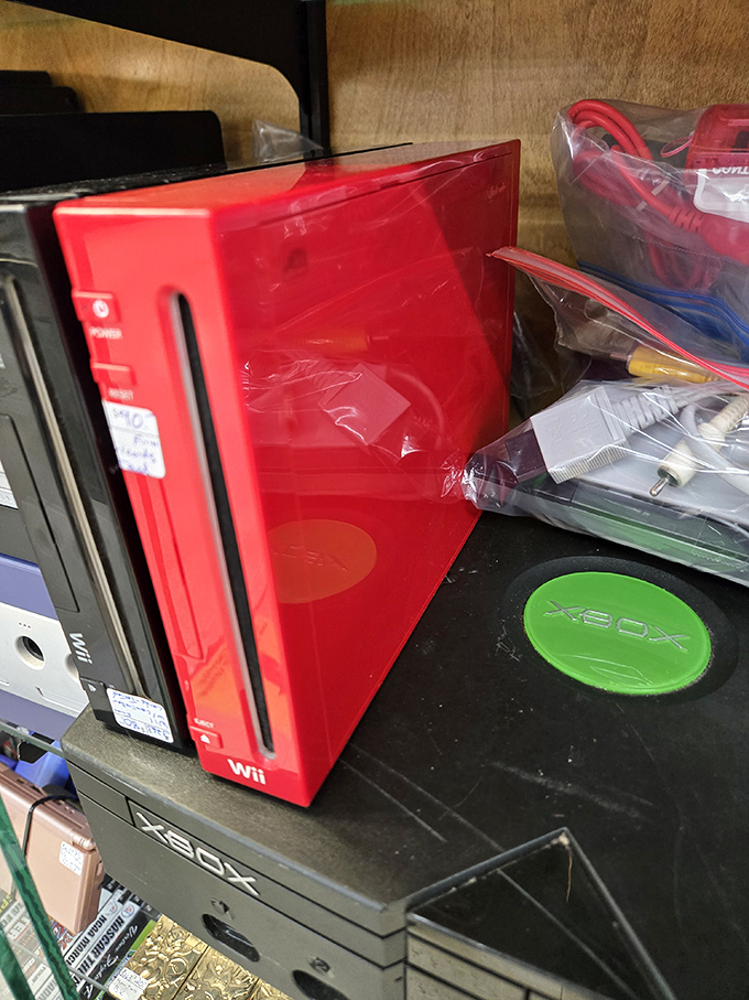 That red Wii is rarer than common sense at a buffet, and probably worth more too.